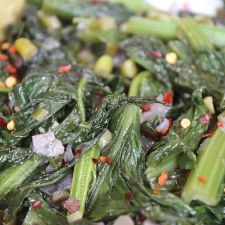 Sautéed Mustard Greens with Shallots, Garlic Scapes & Lemon - Eat the Bite