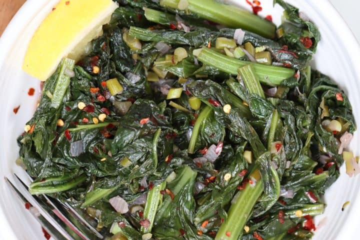 Sautéed Mustard Greens with Shallots, Garlic Scapes & Lemon - Eat the Bite